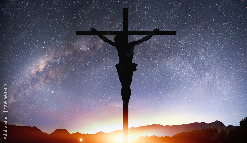 Beautiful night landscape with silhouette of Jesus on the cross on the ...