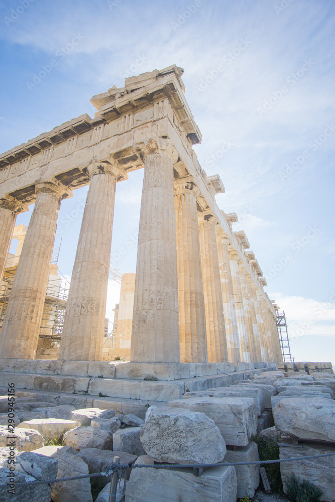 A beautiful sunny day at the acropolis hill in Athens Greece , this iconic Parthenon is just ...