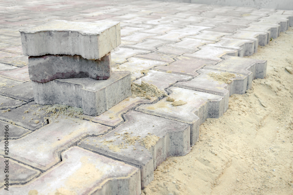 .road work to replace paving slabs. repair of the sidewalk, paving ...