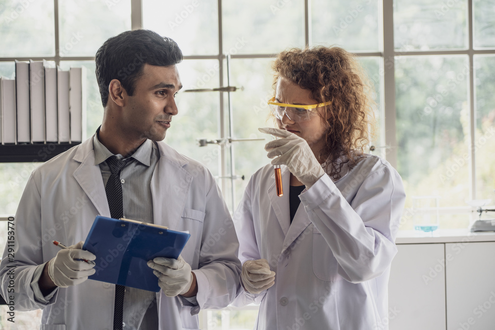Team of Medical Research Scientist Conducts Experiments in Laboratory ...