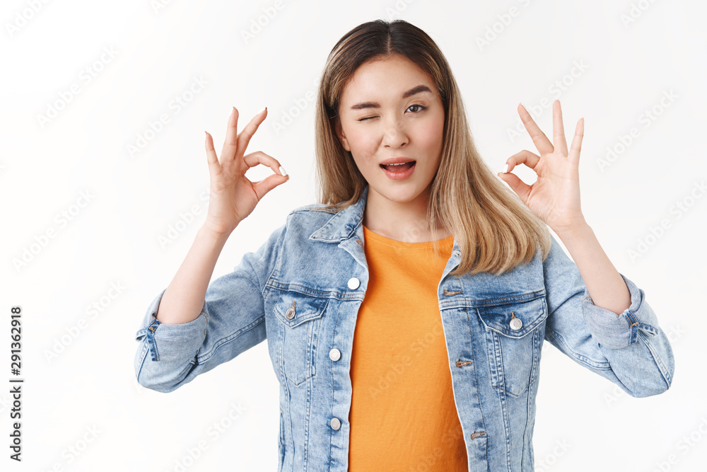 Okay got it. Assertive friendly good-looking asian blond woman assuring ...