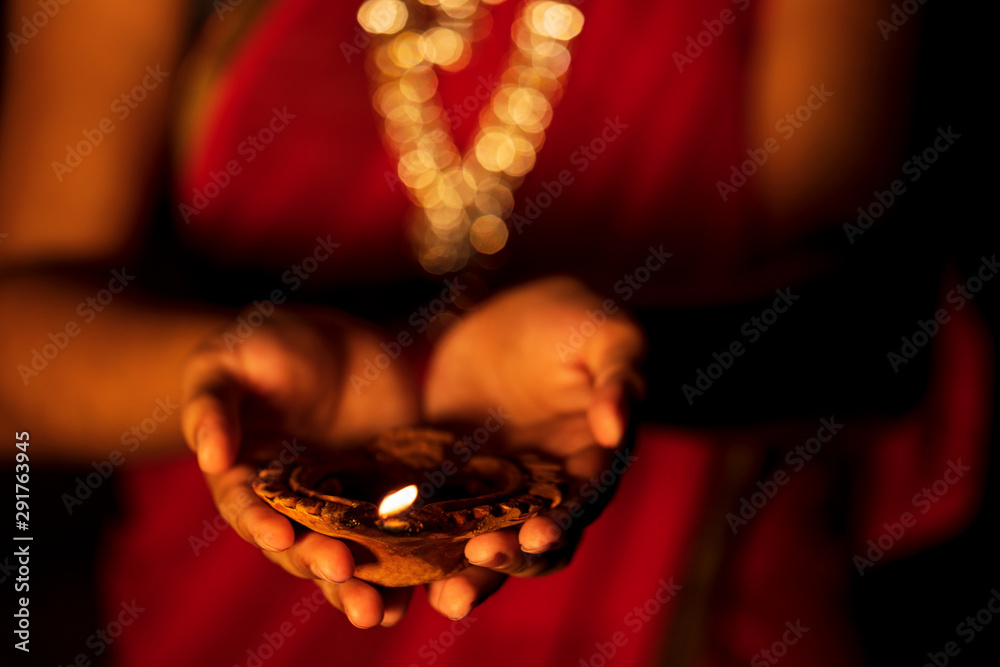 Bengali Bride Holding Diwali Diya. Happy Diwali - A beautiful woman or ...