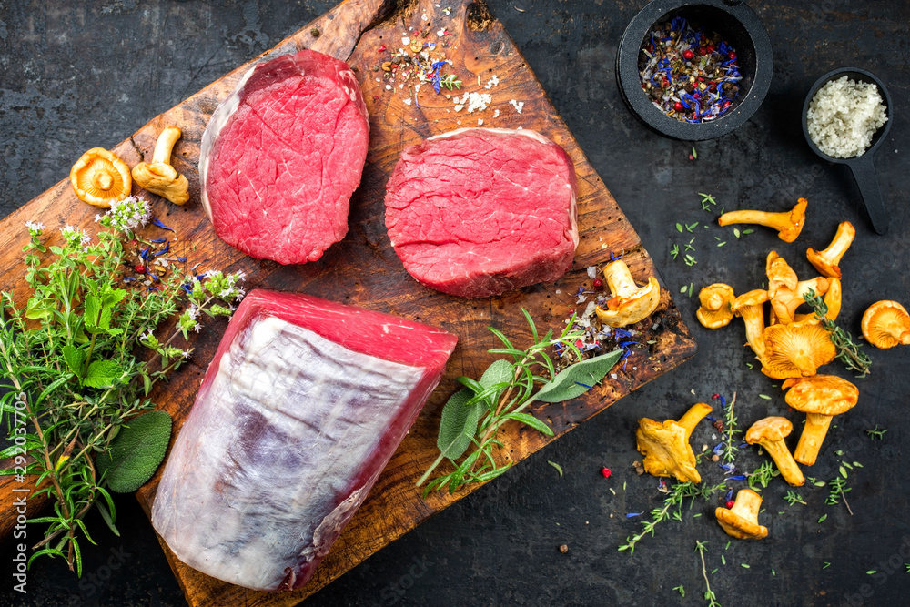 Dry aged beef fillet medallion steak natural with chanterelles as top ...