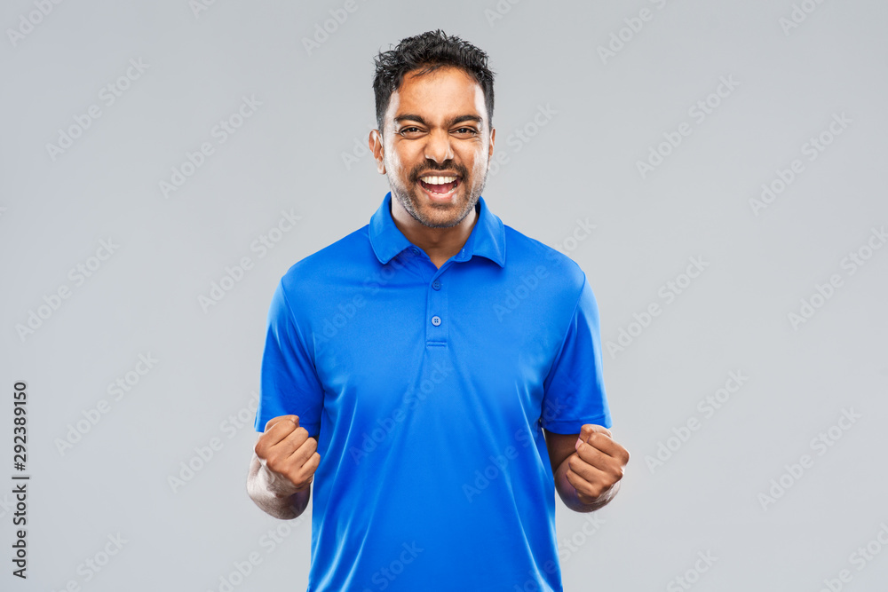 success, emotion and expression concept - happy young indian man ...