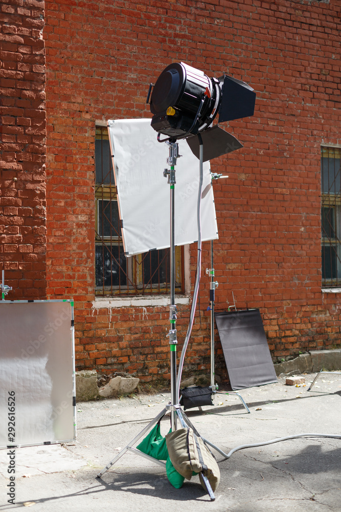 Process of filming. Spotlight illuminates window. Stock Photo | Adobe Stock
