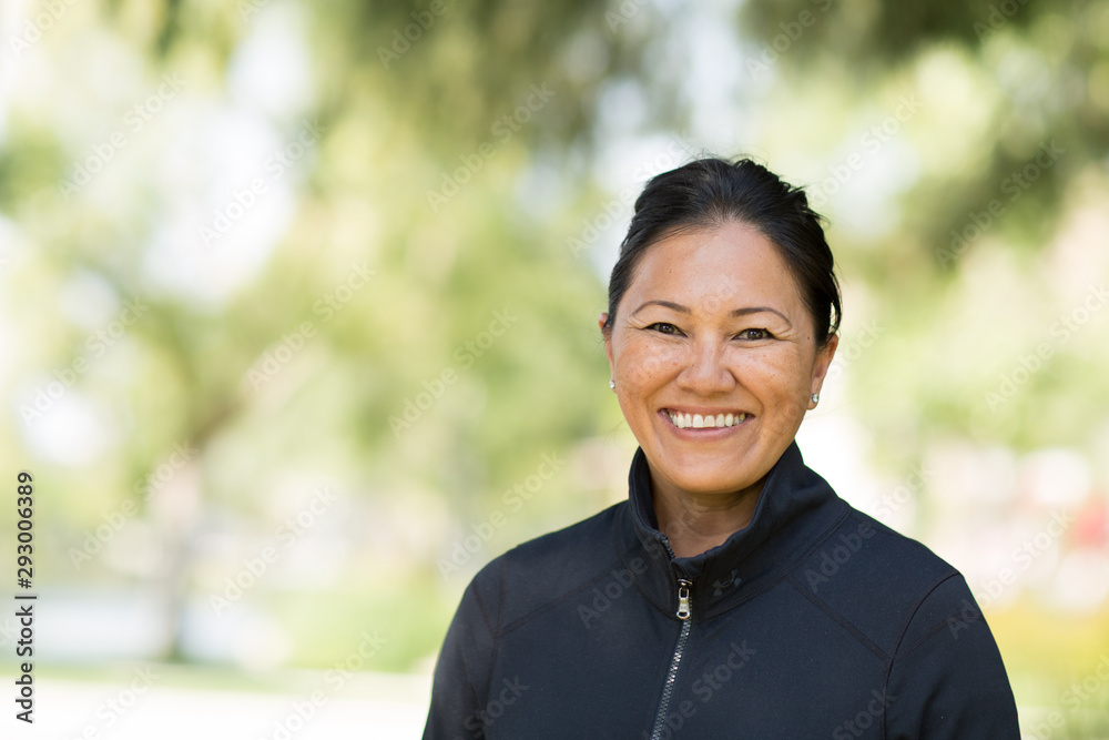 Portrait of a fit Asian woman exercising. Stock Photo | Adobe Stock