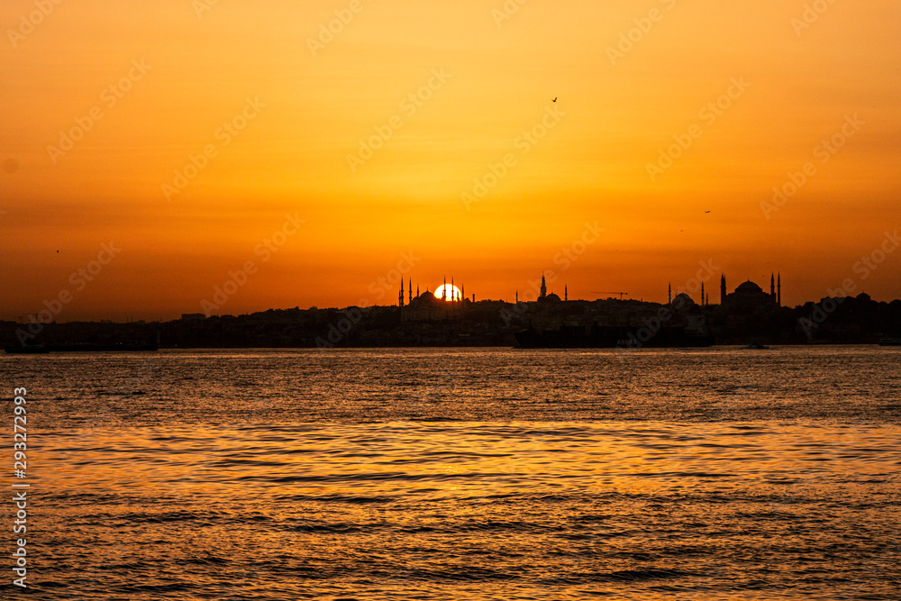 Cityscape of Istanbul with silhouettes of ancient mosques and minarets ...