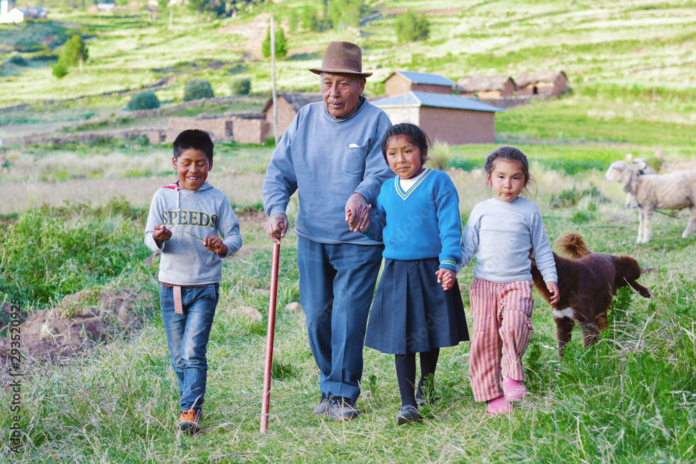 Happy native american family in the countryside. Grandfather and his ...