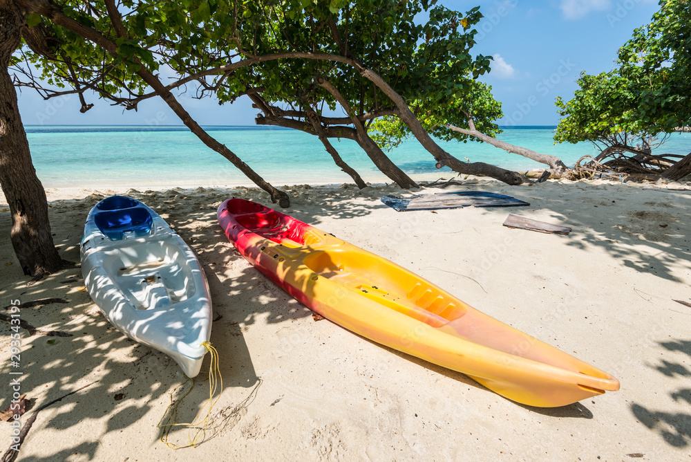 Colorful Kayaks on the sandy beach of the Maldives. Paradise tropical ...