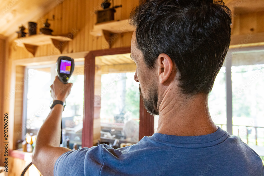 Indoor damp & air quality (IAQ) testing. A close up and off to the side ...