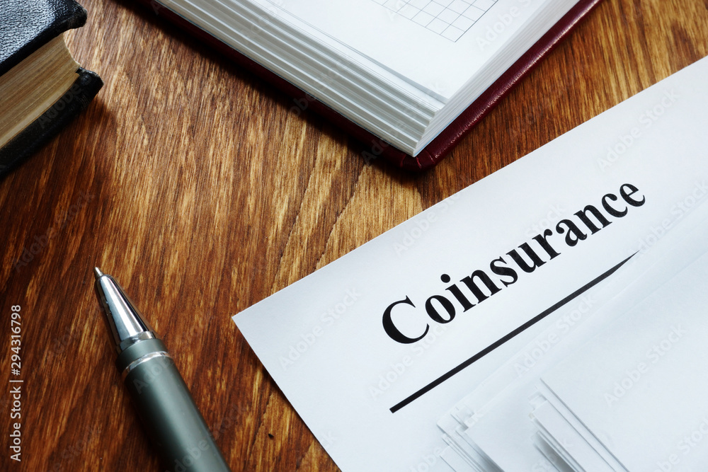 Coinsurance concept. Stack of insurance documents on desk. Stock Photo ...