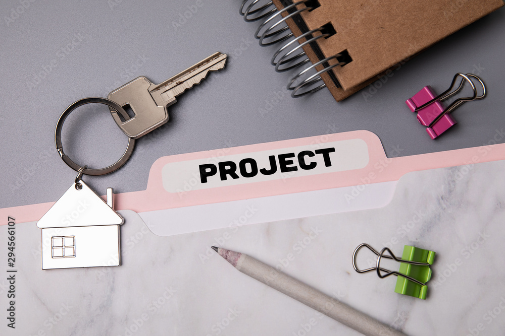 Project. File folder, stationery and home keys on the office desk Stock ...