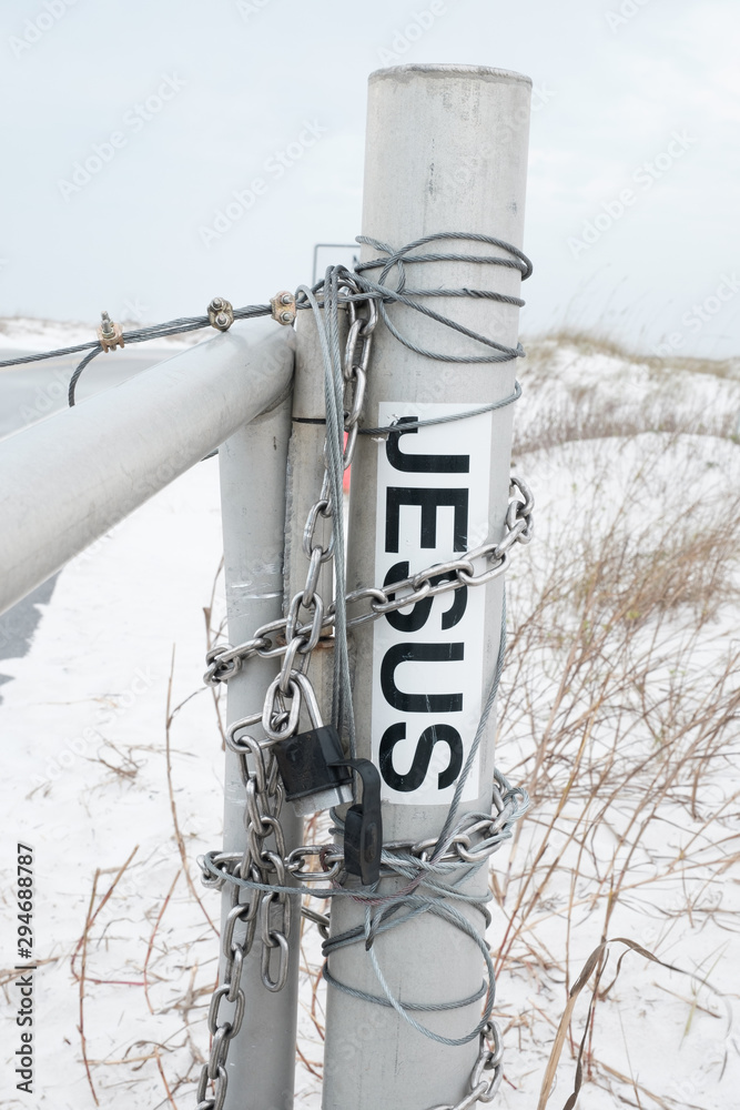 Jesus Sticker on a Gate Stock Photo | Adobe Stock