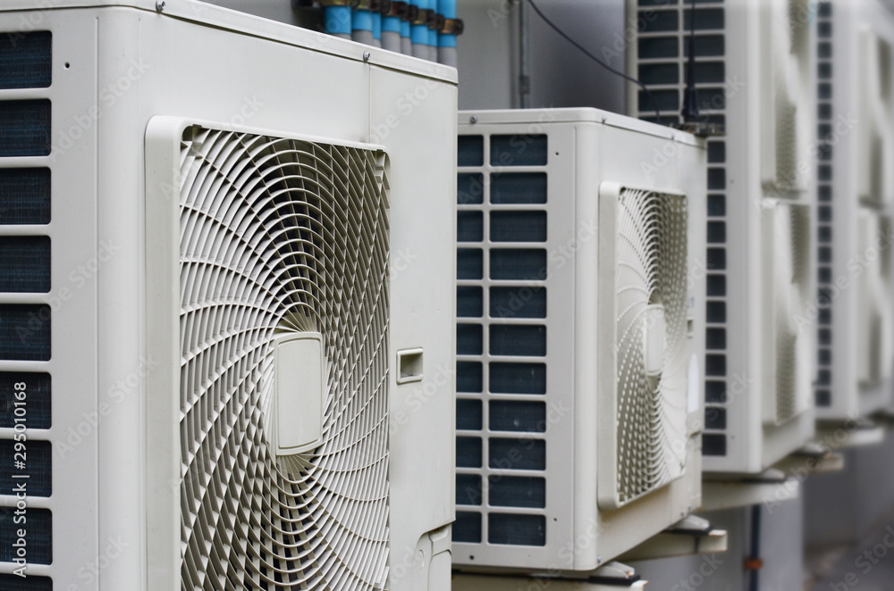 Air compressor machine part of air conditioner system on roof deck. Air ...