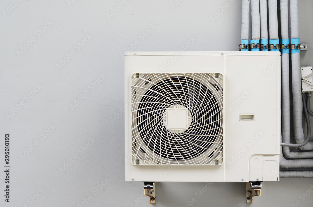 Air compressor machine part of air conditioner system on roof deck. Air ...