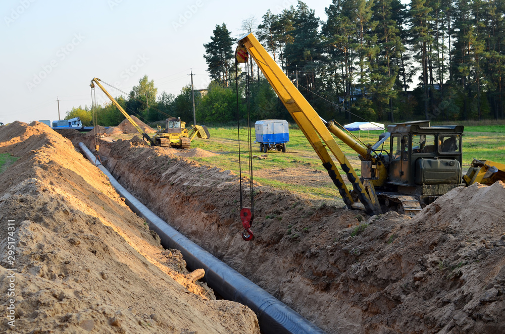 Natural gas pipeline construction work. A dug trench in the ground for ...