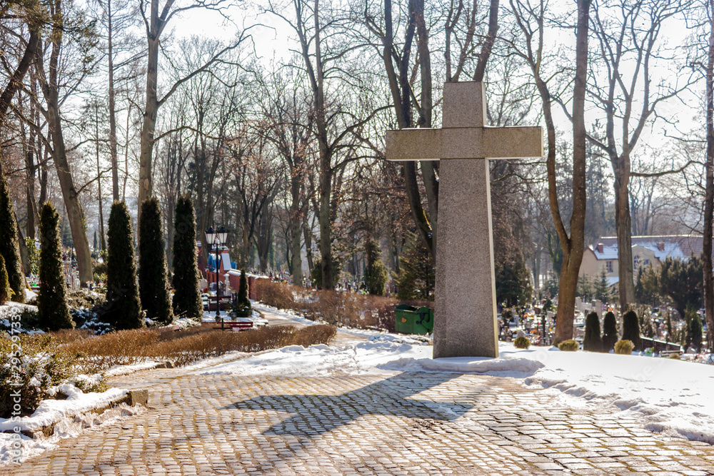 Cross on graveyard. Symbol of Jesus crucifixion and ressurection, faith ...
