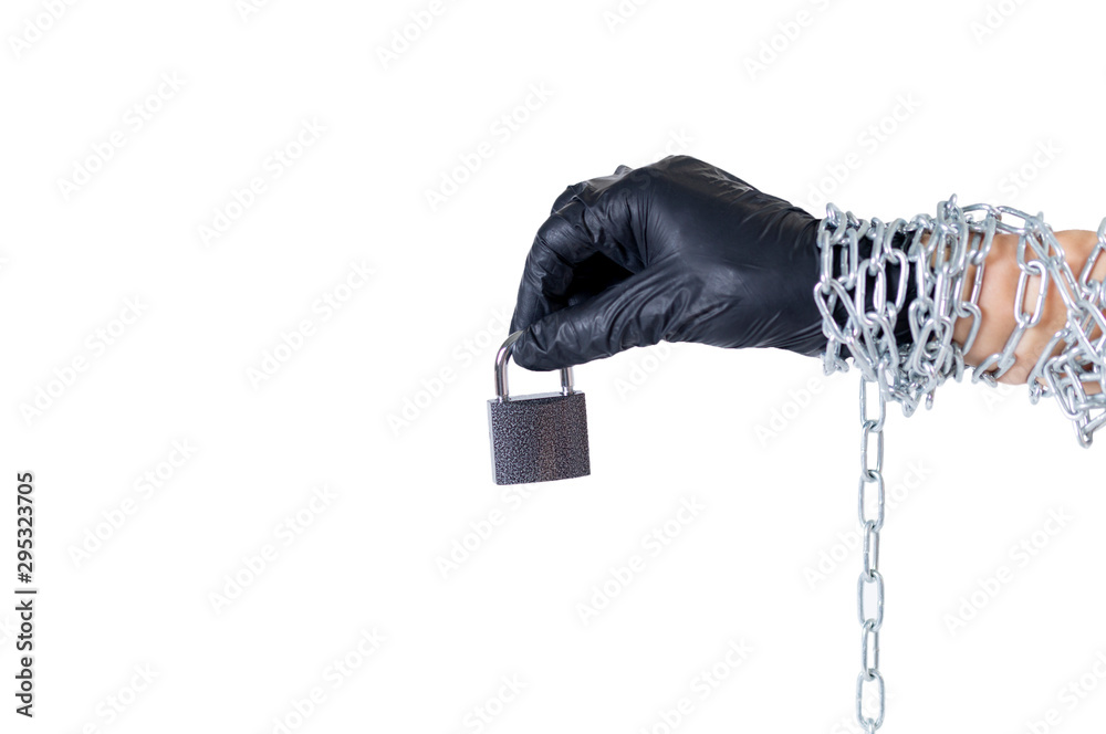 free, hand in black glove chain lock, the concept of liberation and ...