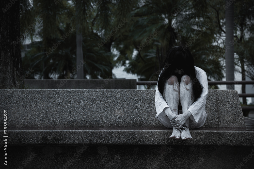 Woman ghost horror sitting her hug, Stock Photo | Adobe Stock