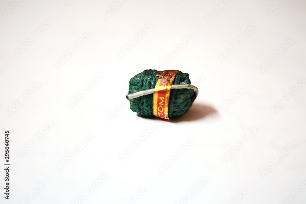 Diwali fire bomb cracker on white background Stock Photo | Adobe Stock