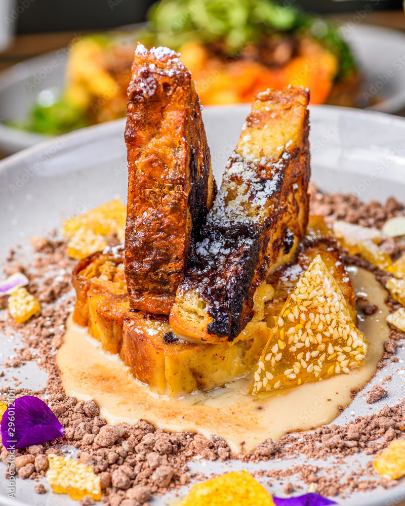 Pan fried Pain Au Chocolate pudding with Chai Custard and Sesame Snaps ...