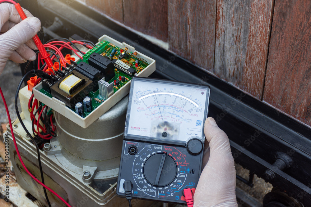 Closeup technician man hand repairing and checking the functional of ...