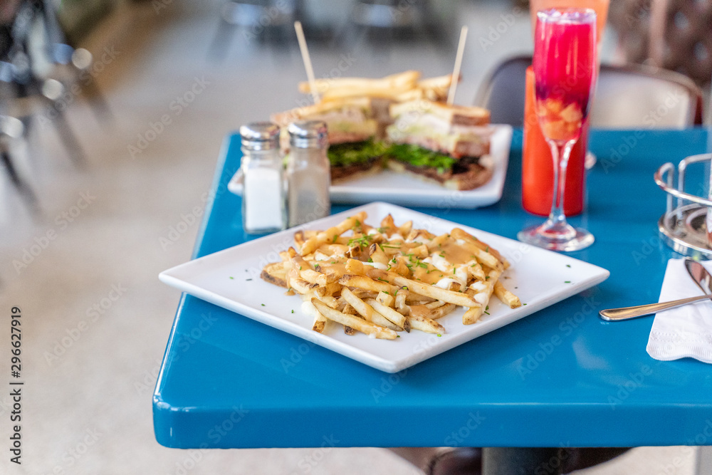 Poutine Fries with gravy and cheese curds Stock Photo | Adobe Stock