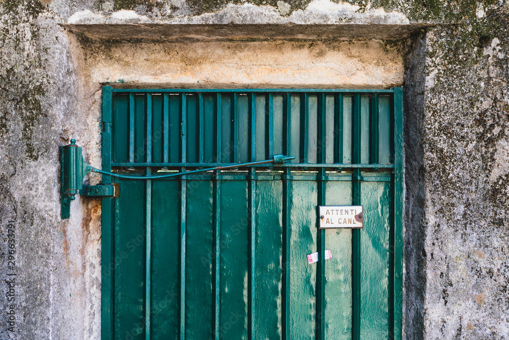 Warning sign Attenti al cane which means beware of dog in Italian ...