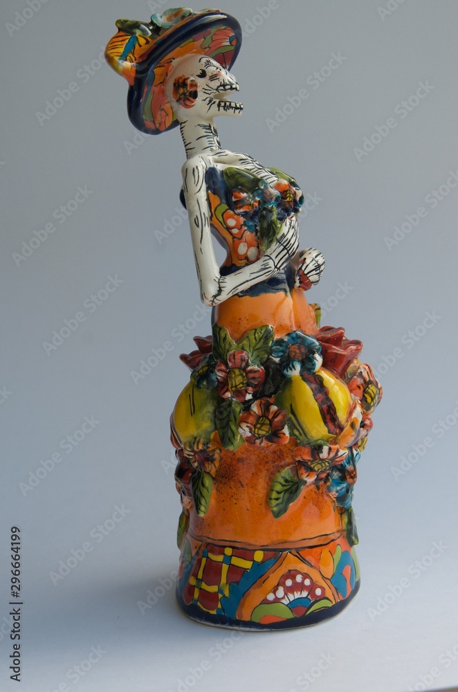 skeleton dressed in typical Mexican costumes celebrating the day of the ...