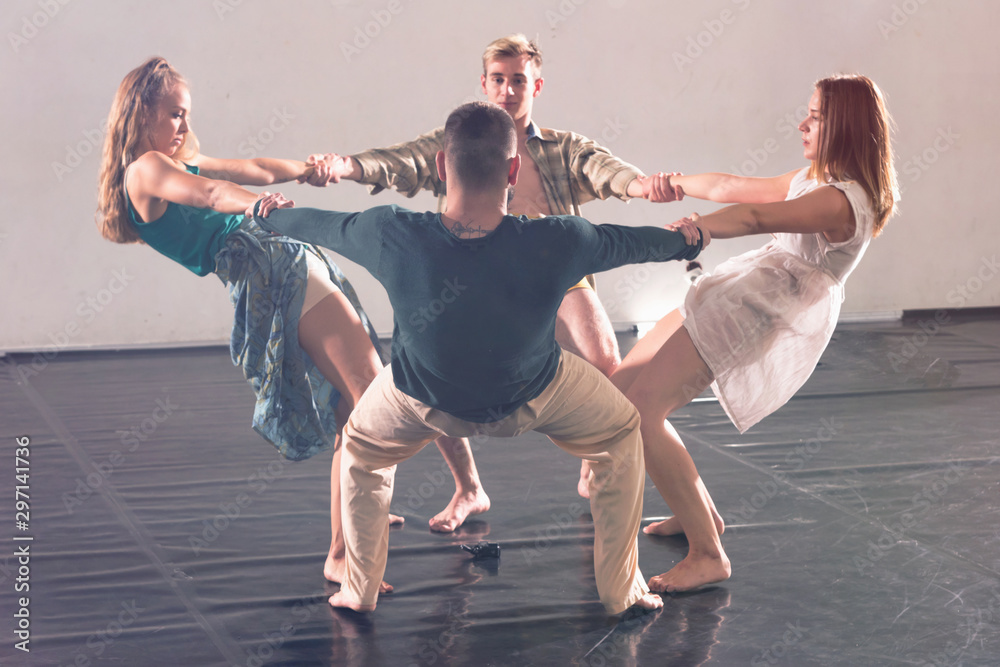 Young modern dancers dancing in the studio. Sport, dancing and urban ...