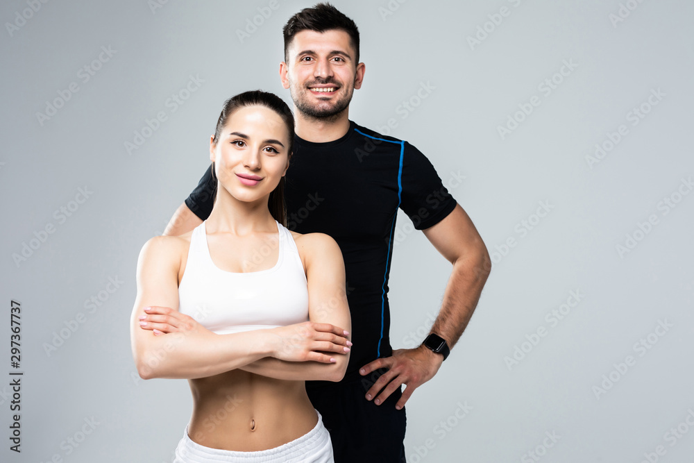 Team of fitness coaches man and woman isolated on white background ...