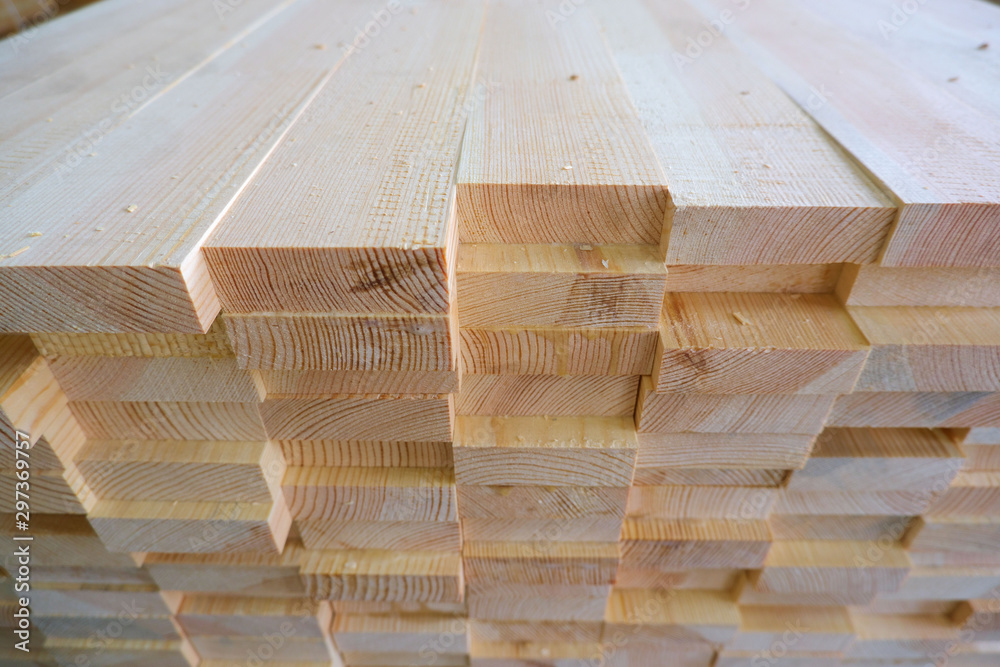 Top-end view of stack of three-layer wooden glued laminated timber ...