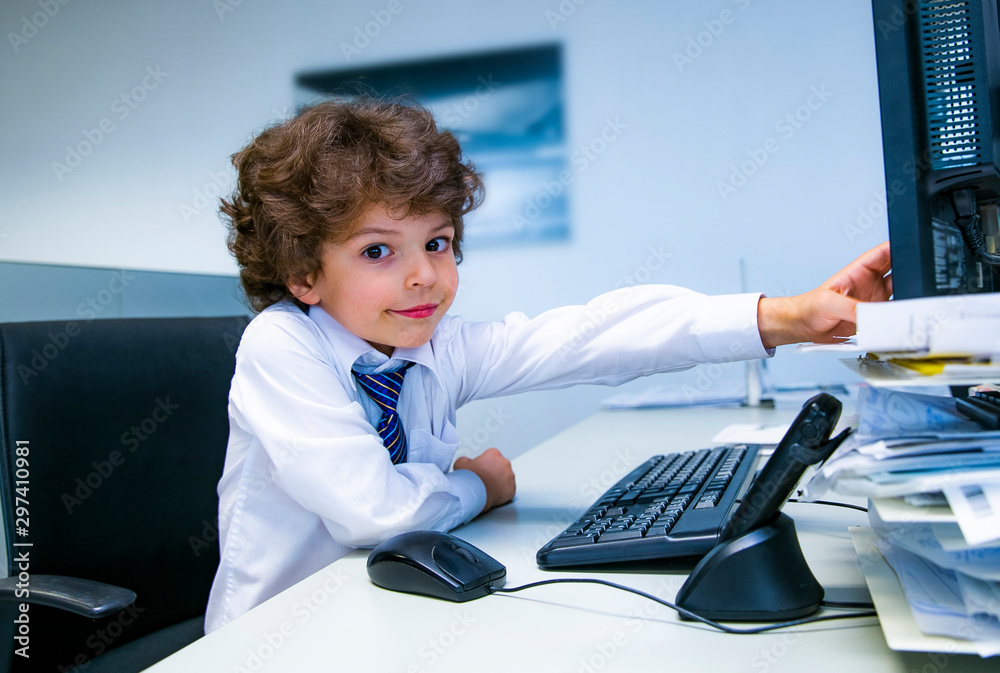Cute beautiful little boy children play as office worker sitting on ...