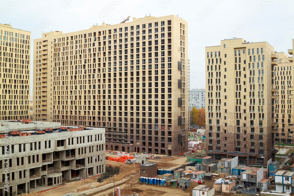 school building under construction in courtyard of apartment buildings ...