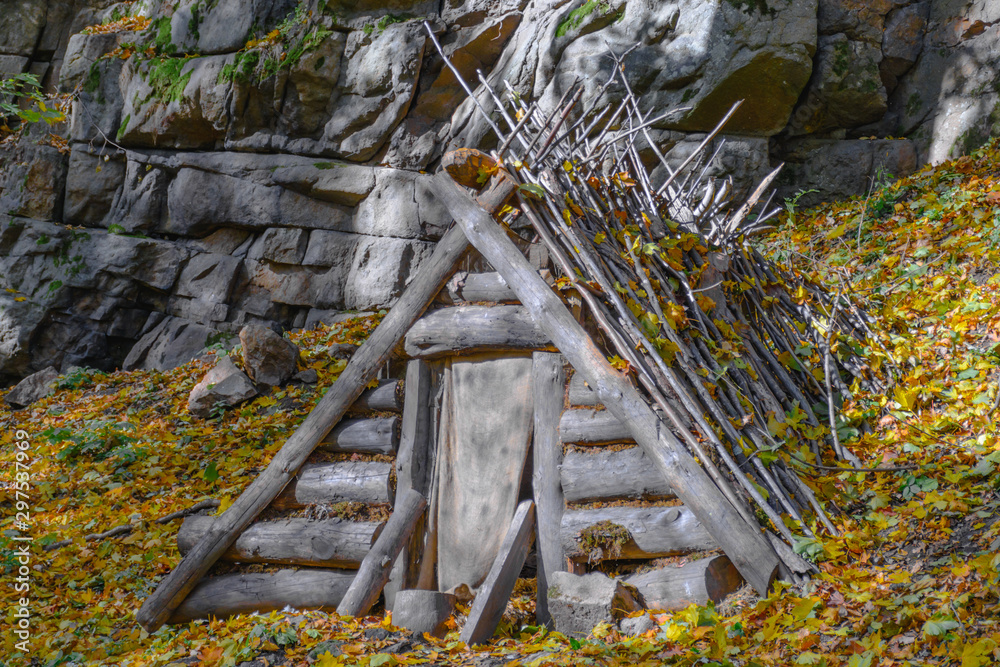 Stock-Foto „Dugout (or dug-out, pit-house, earth lodge, cellar dug ...
