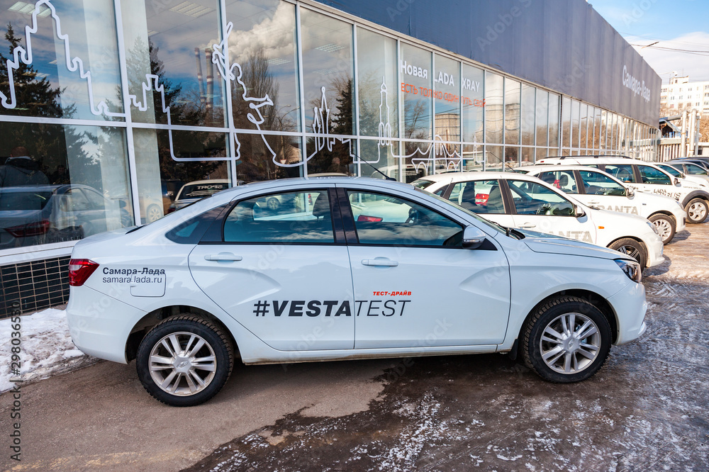 Vehicle Lada Vesta near the office of official dealer. Lada is a ...