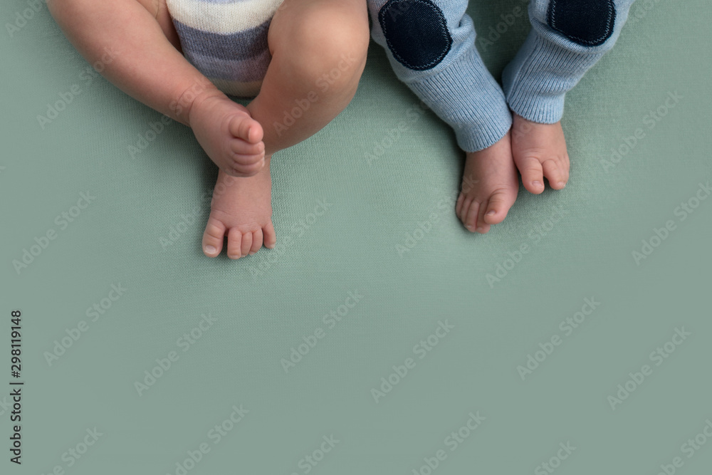 feet of twins newborns, brother and sister, multiple pregnancy. Stock ...