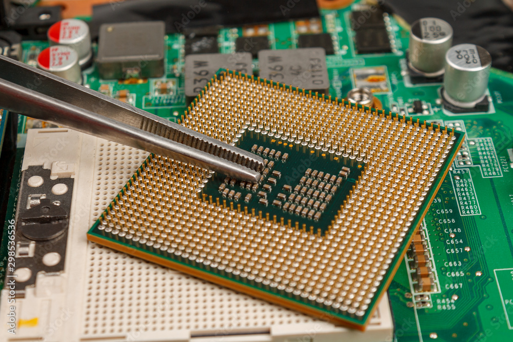 computer CPU close-up on the motherboard background, socket of central ...