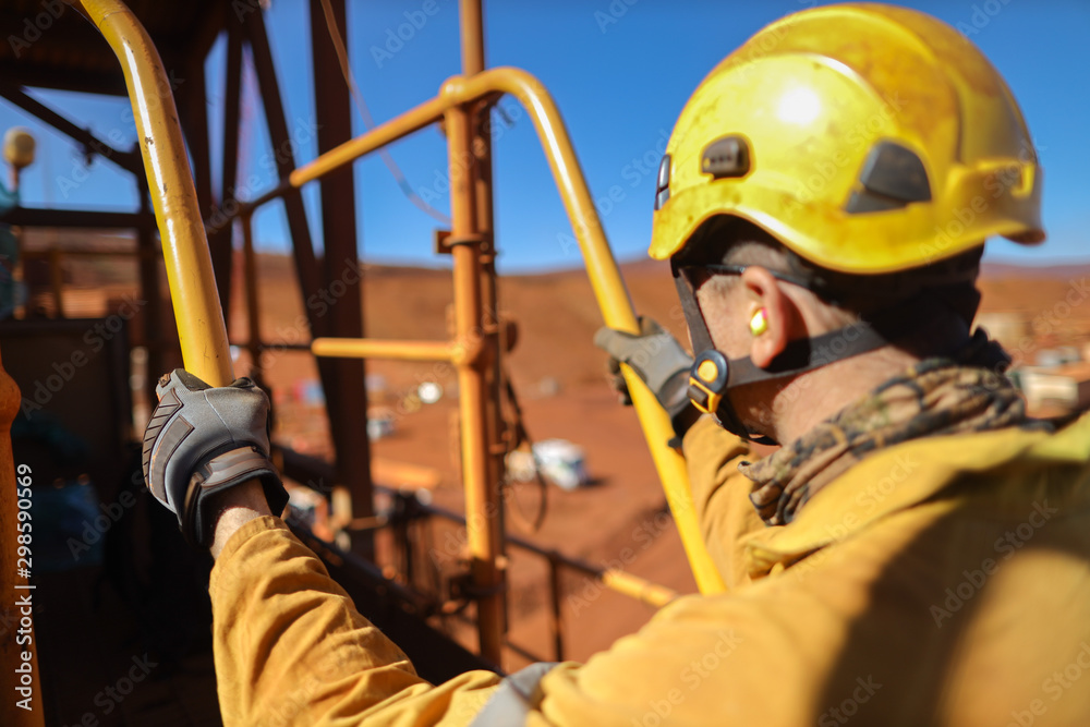 Side view good safety practice of male miner wearing safety helmet ...