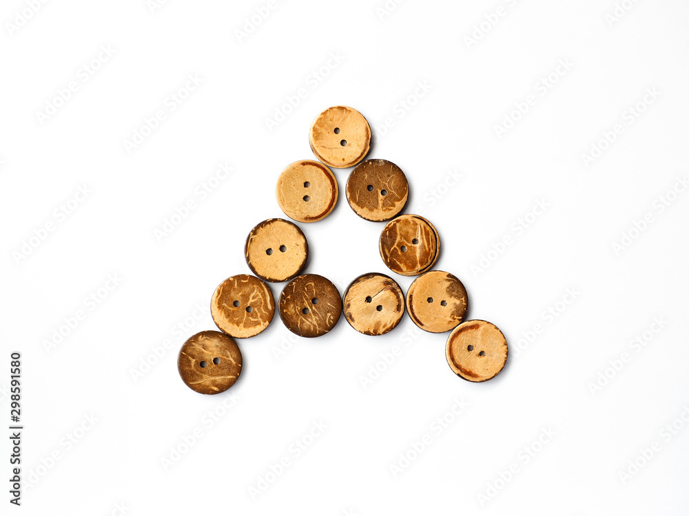 Font A, Alphabet "A" made from Buttons from Coconut shell on white ...