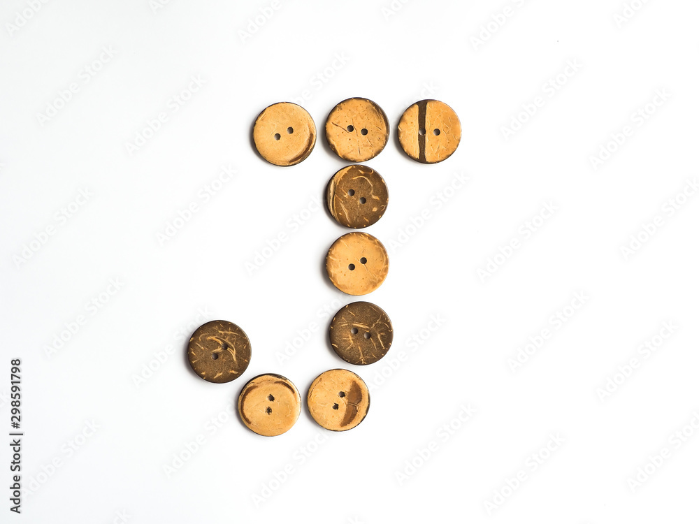 Font J, Alphabet "J" made from Buttons from Coconut shell on white ...
