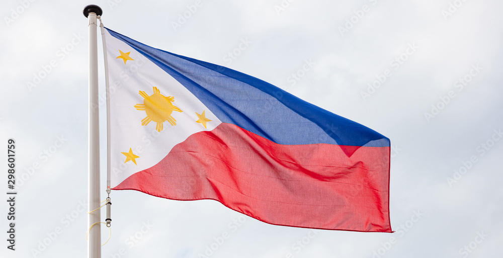 Philippines flag waving against cloudy sky background Stock Photo ...