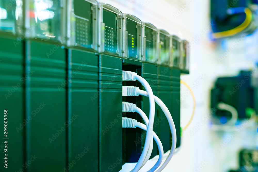 The white wires are connected to the green junction boxes. Provision of ...