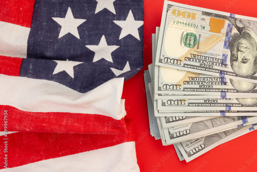 United States or USA 100 dollar currency on a red background and a ...