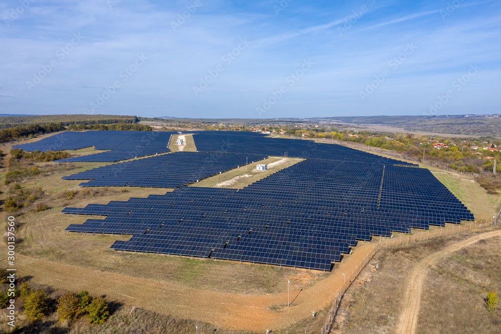 Aerial view of industrial photostatic solar units panels. Photovoltaic ...