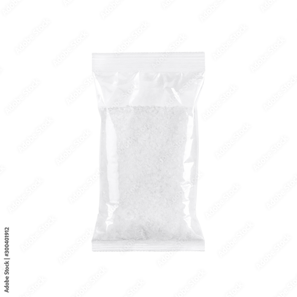 Salt in transparent plastic pouch pillow bag isolated on white ...