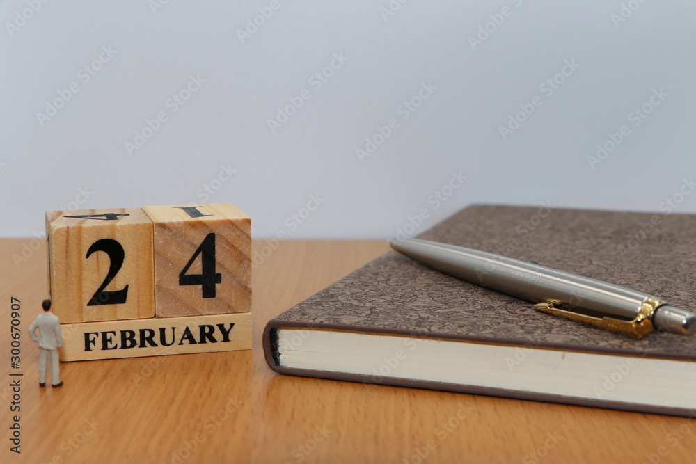 February 24, a calendar photo from the wood The table top consists of a ...