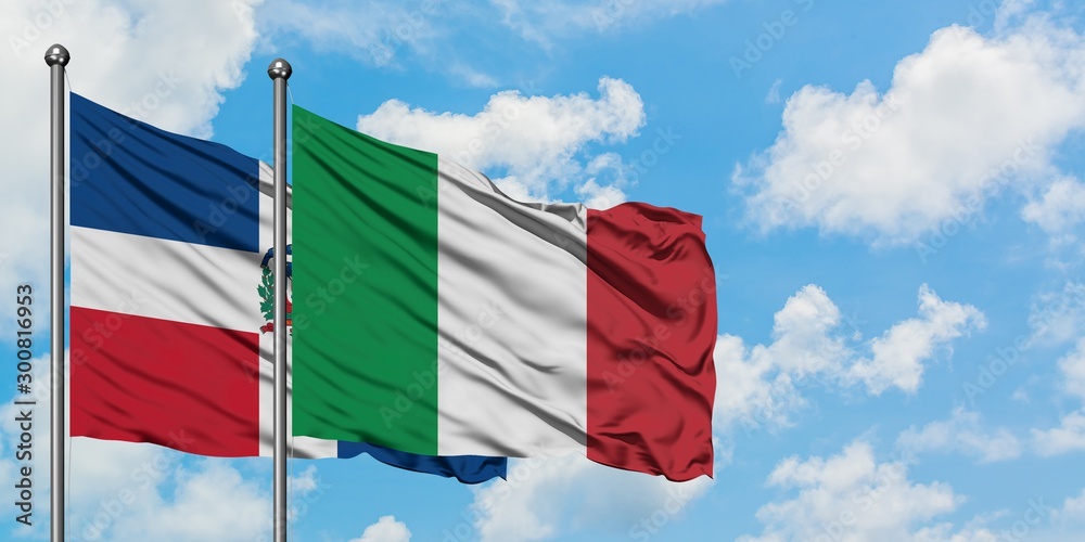 Dominican Republic and Italy flag waving in the wind against white ...