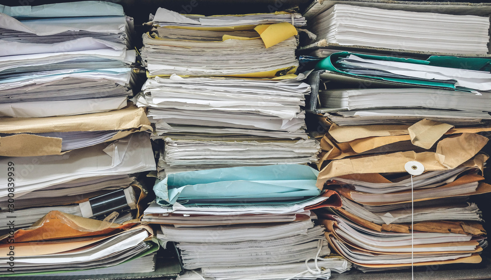 The stack of paper are old file, document, letter or contract look ...