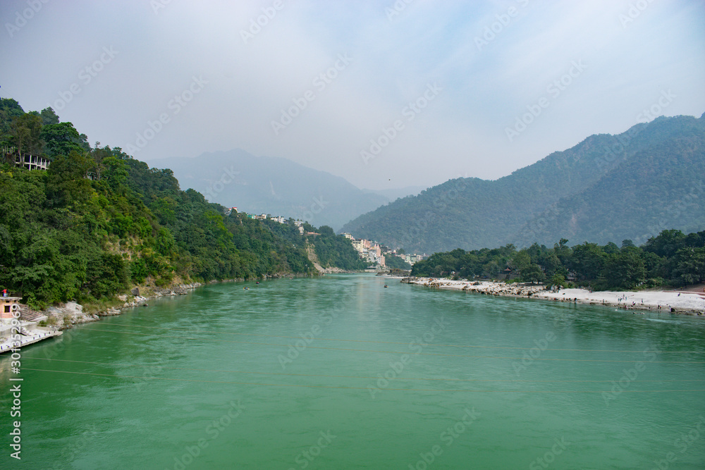 beautiful green water of River Ganges flowing in the mountains of ...